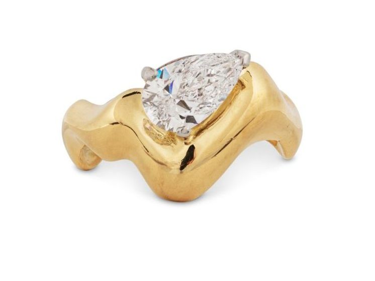 12 Captivating Floating Diamond Rings for Modern Couples
